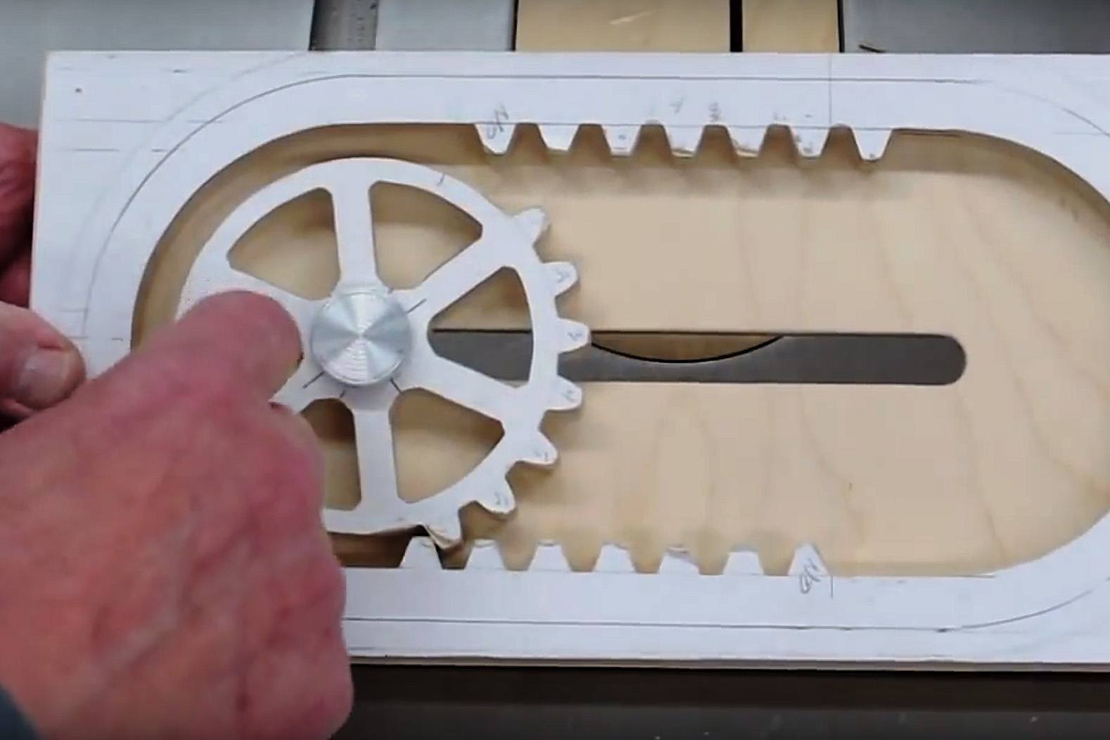 Mechanism having slide and rotation motion with one part being stationary | GrabCAD Questions