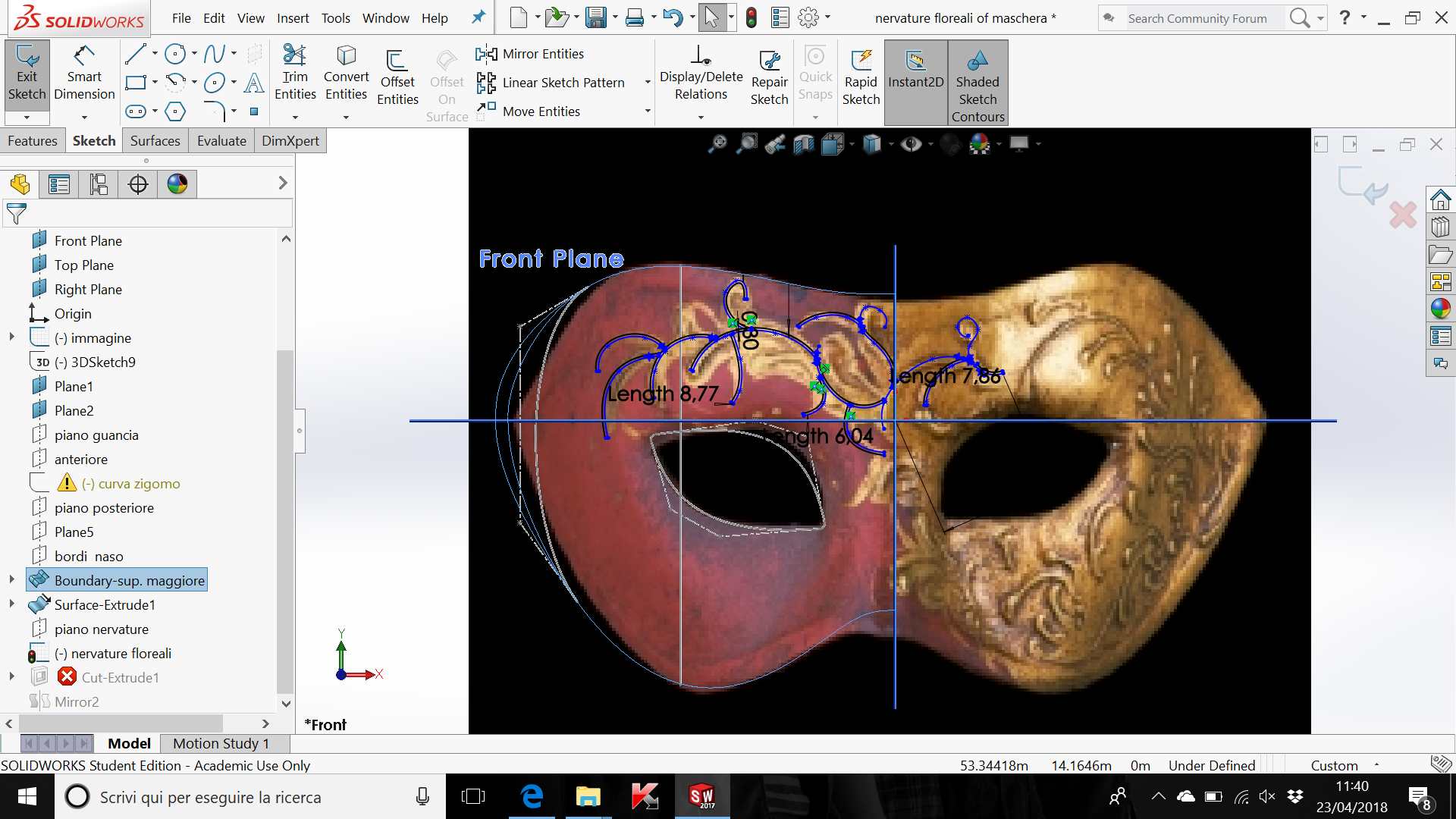 How to create a complex emboss on Solidworks? (pictures in the link ...