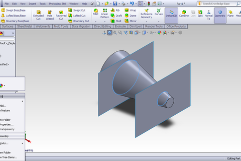 Tutorial - Splitting part into assembly in SolidWorks? - GrabCAD